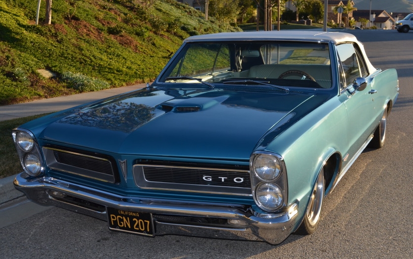Black plate lowrider: 1965 Pontiac GTO Convertible – Classic Virus