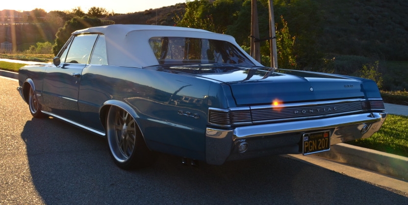 Black plate lowrider: 1965 Pontiac GTO Convertible – Classic Virus